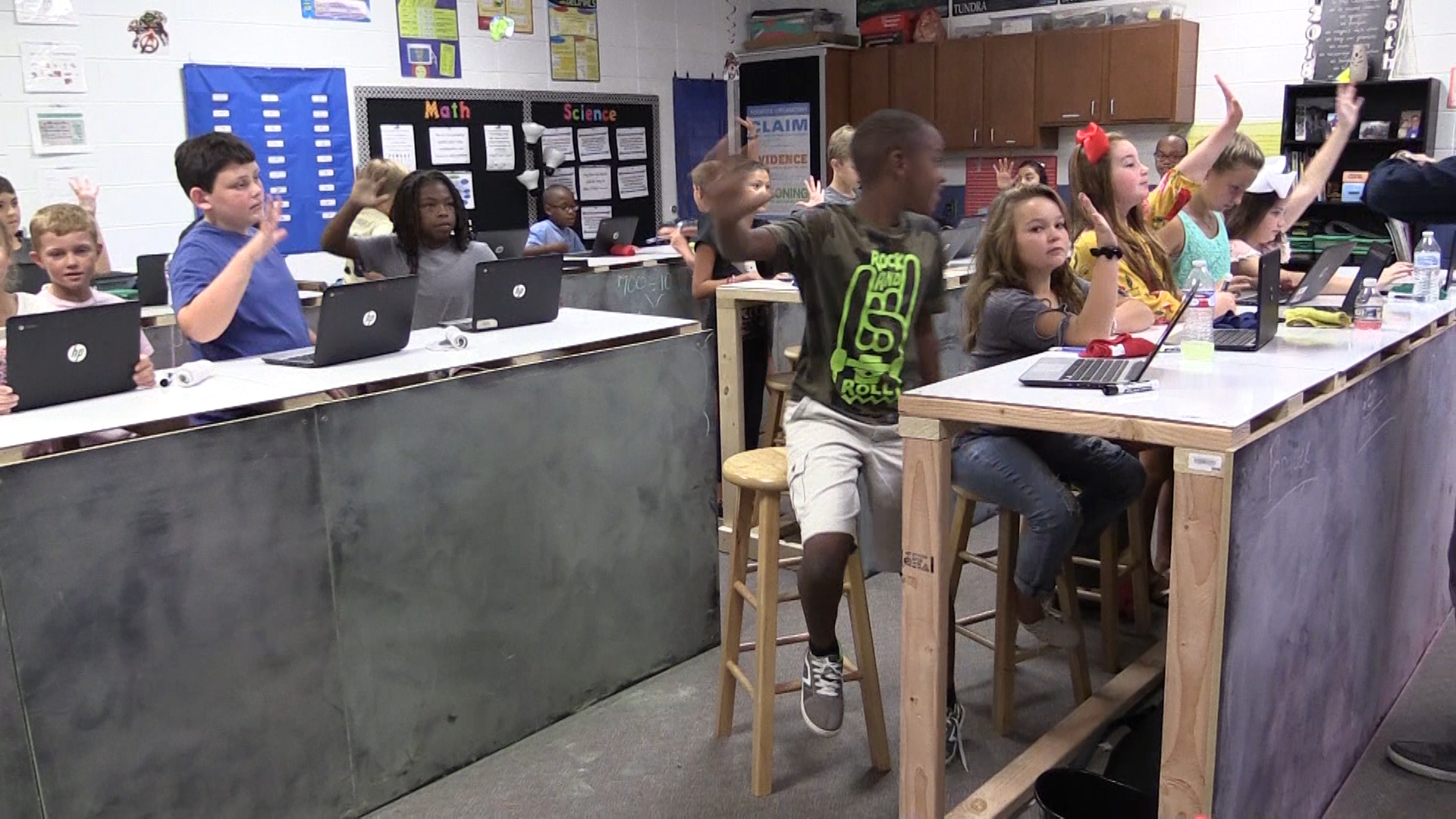 Teacher builds interactive desks for his class to enhance student's ...