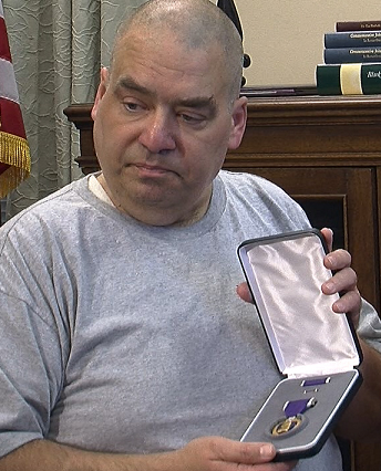 Father receives a new Purple Heart after son's was stolen