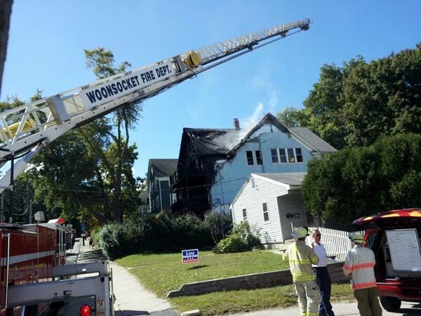 2 fire fighters injured, 14 displaced in Woonsocket fire