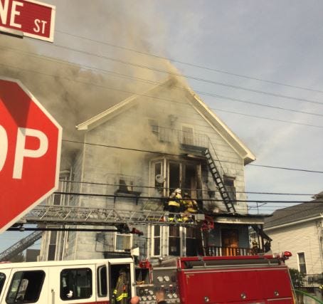 Firefighters battle 2 alarm fire in Central Falls