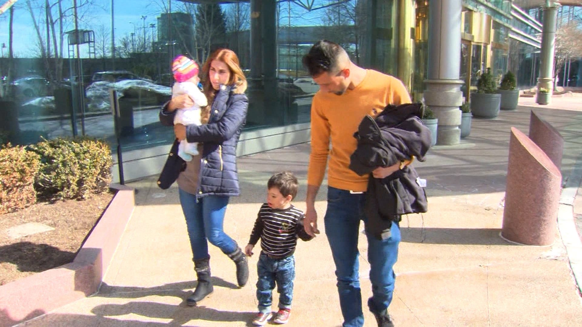 Iraqi family reunited with 2-year-old son