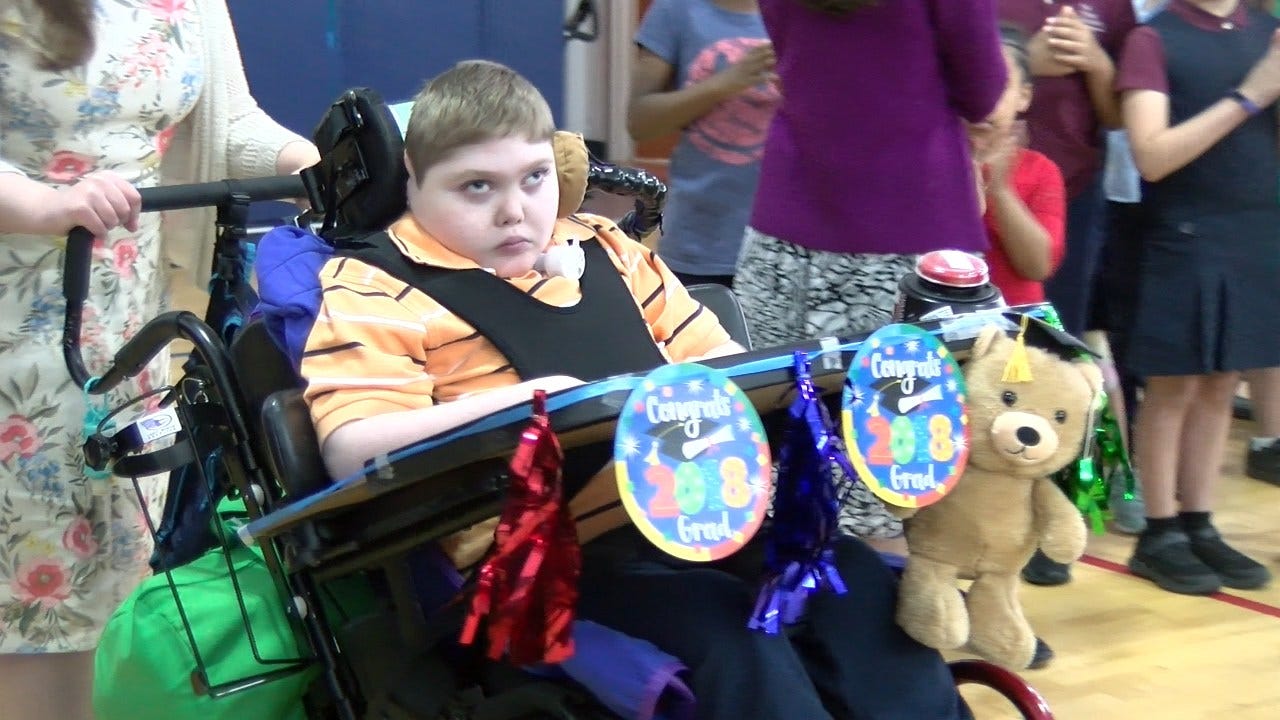 Fully inclusive school celebrates first 8th grade graduation