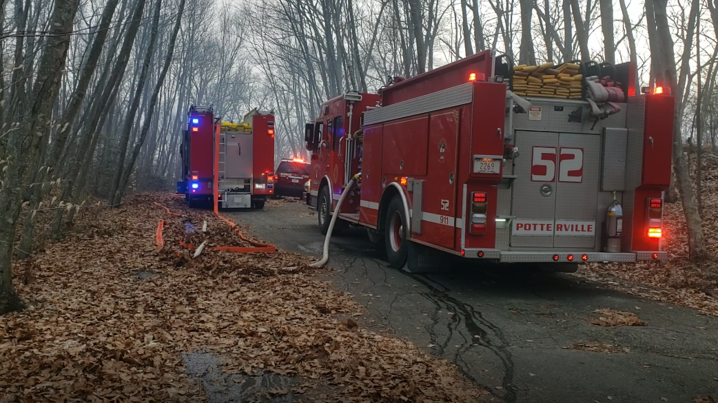 Large brush fire spreads through woods off of Centerville Road | ABC6