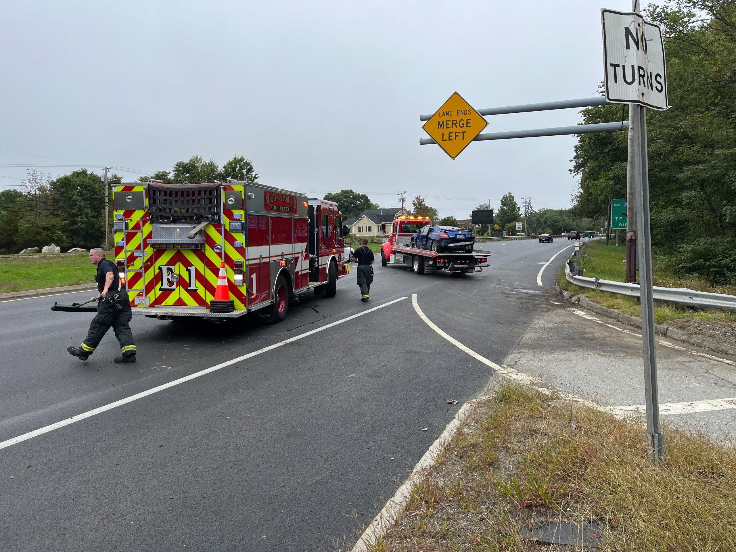Driver taken to hospital after hitting guardrail, flipping over in ...