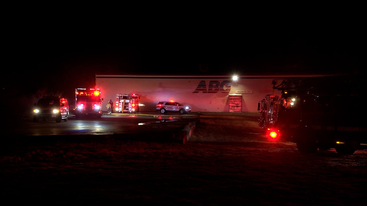Fire near building, train tracks started in homeless encampment | ABC6