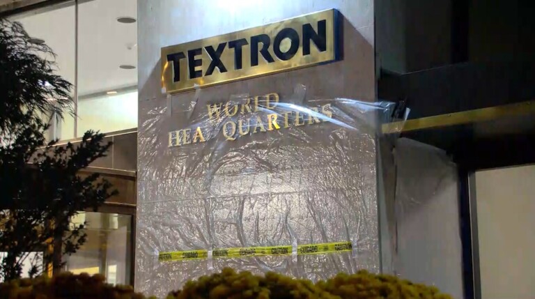 Textron building wrapped in plastic ahead of planned protest | ABC6