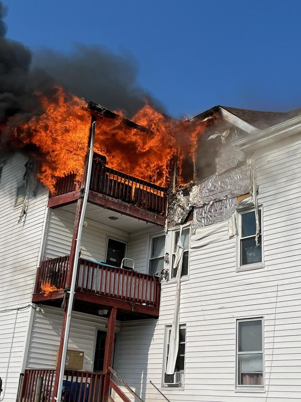 Four hospitalized after Woonsocket 5th alarm fire | ABC6