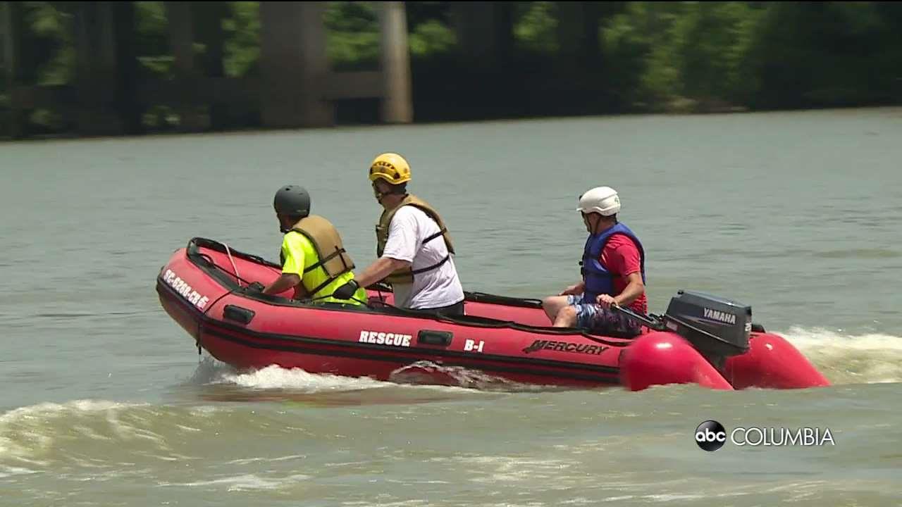 Local firefighters take part in flood rescue training