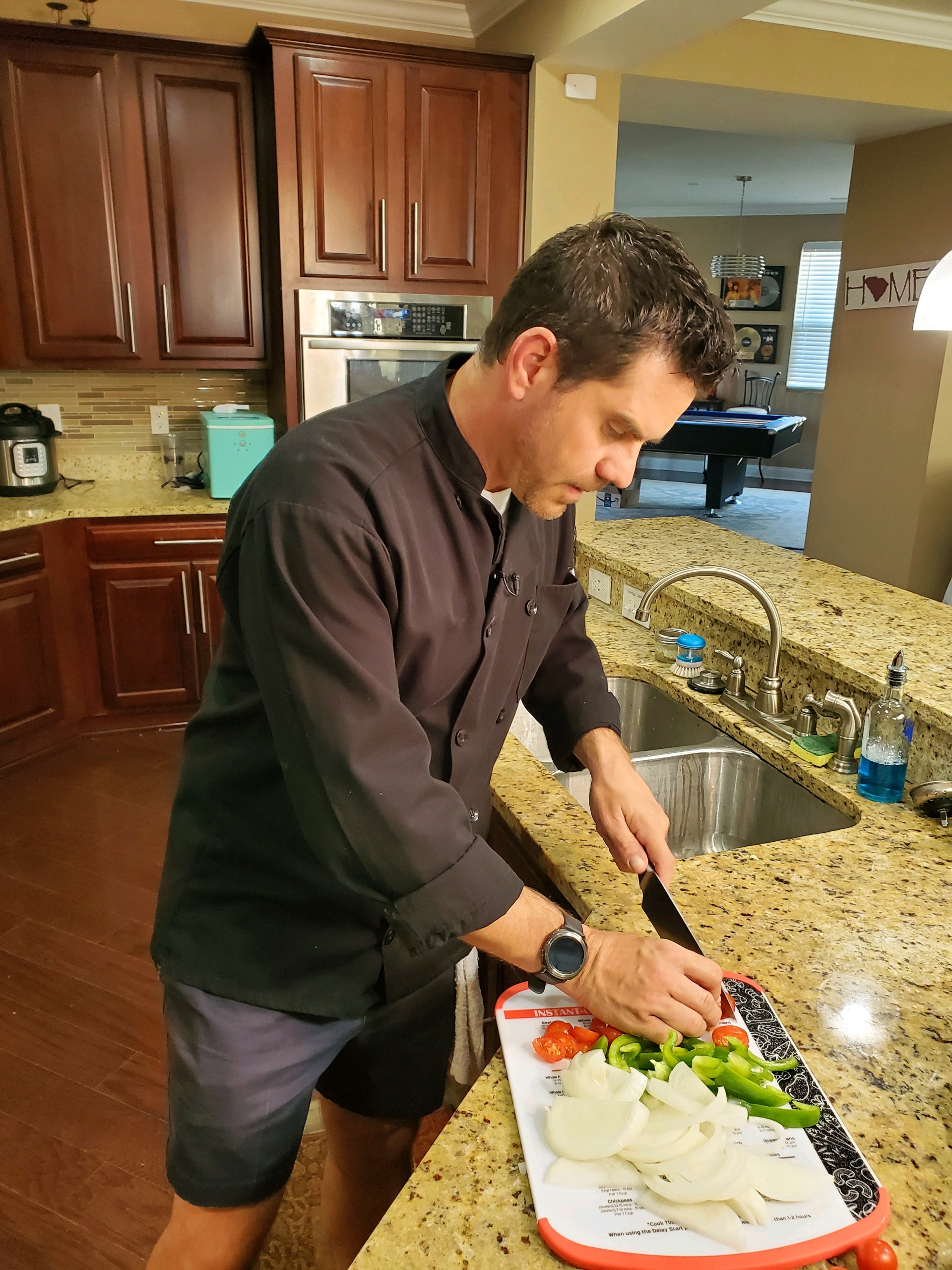Tyler Ryan and Mary Ann Keim put together a family size meal on a ...