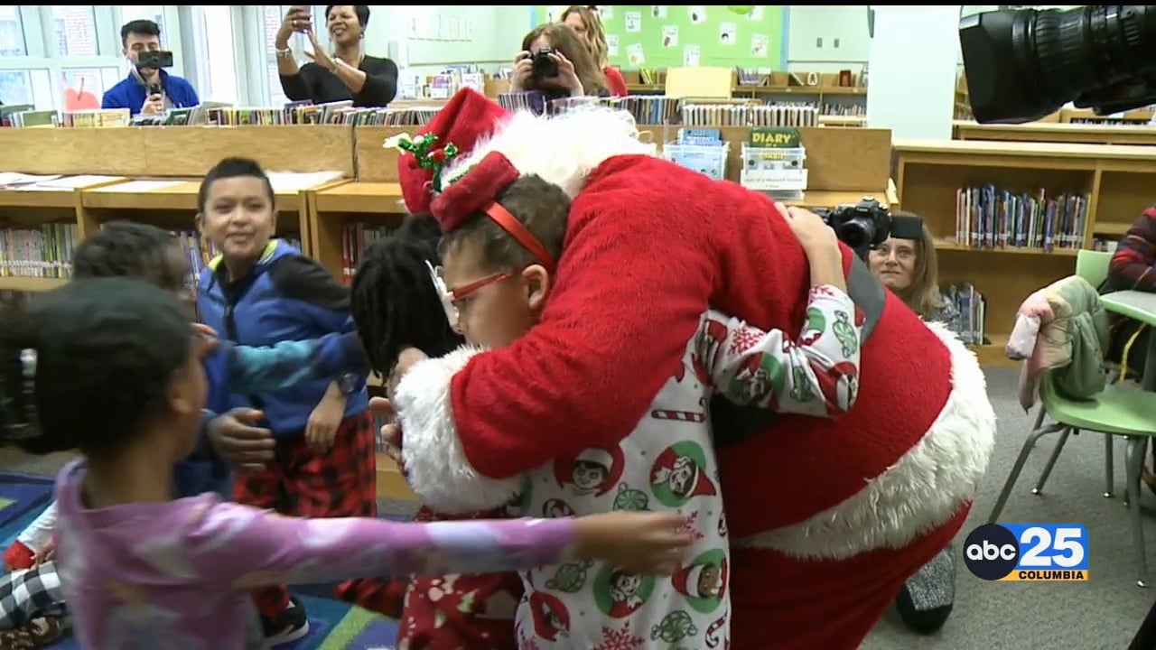 Santa visits deaf and hearing impaired students at Brennen Elementary ...