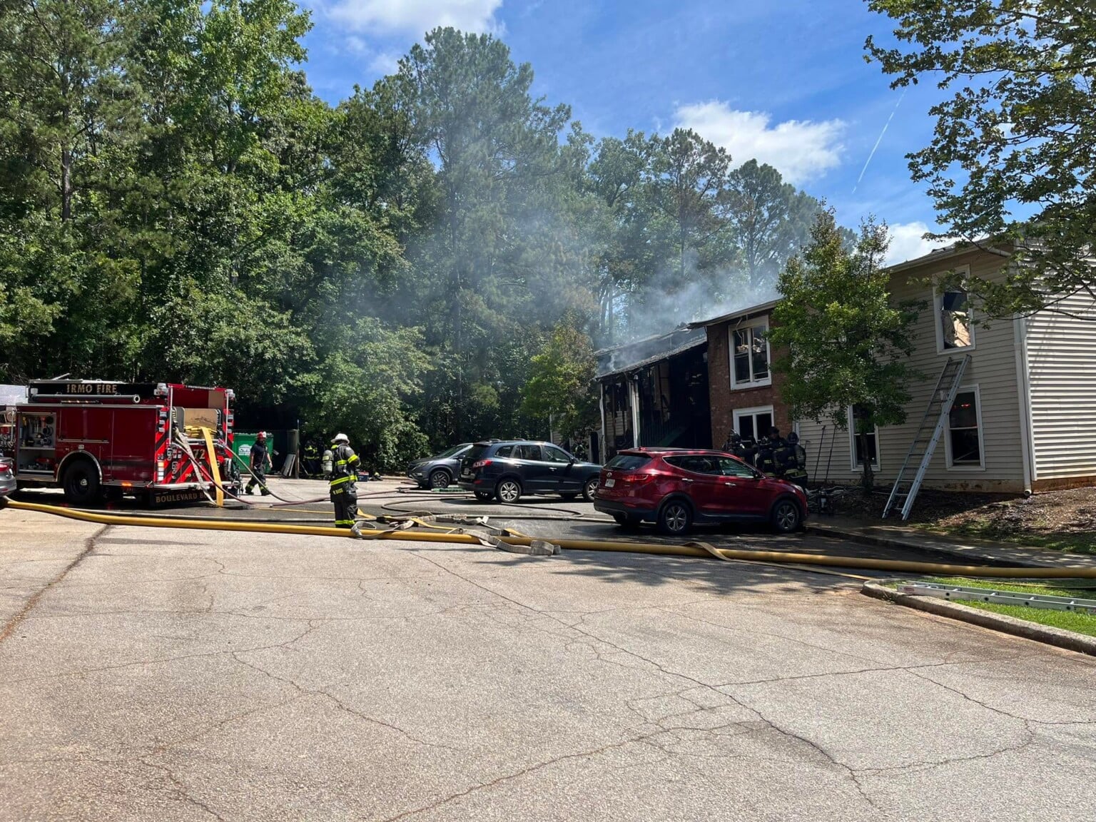 Irmo firefighters work together to control two-alarm apartment building ...