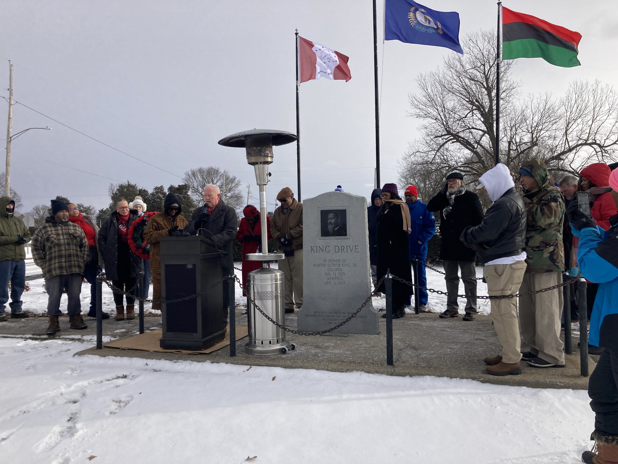 Citizen's and city leaders march in the snow in honor of MLK Junior Day ...