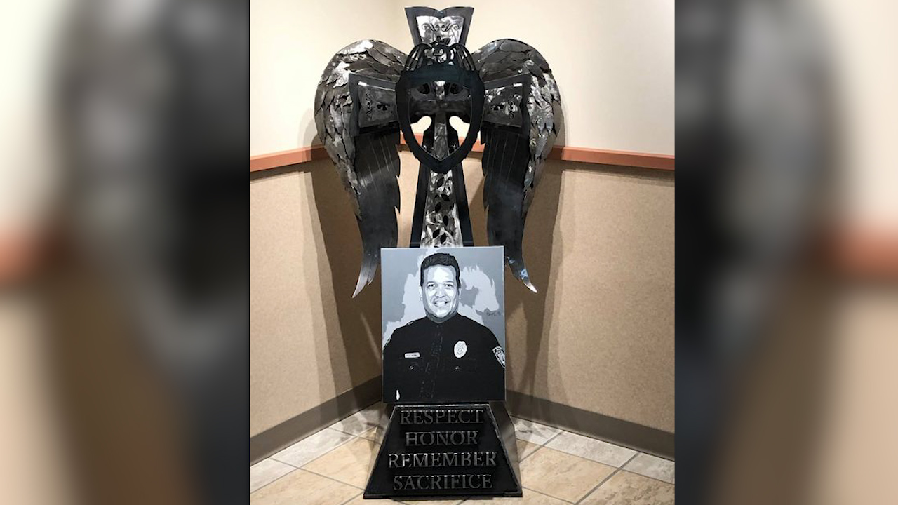 Artist creates a 'Heavy Metal' memorial for a fallen officer