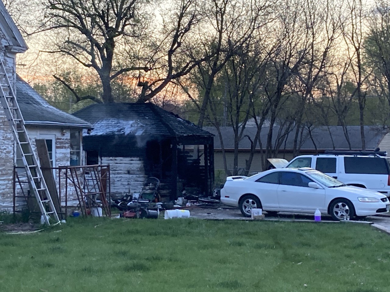 UPDATE: Garage fire caused by fire pit