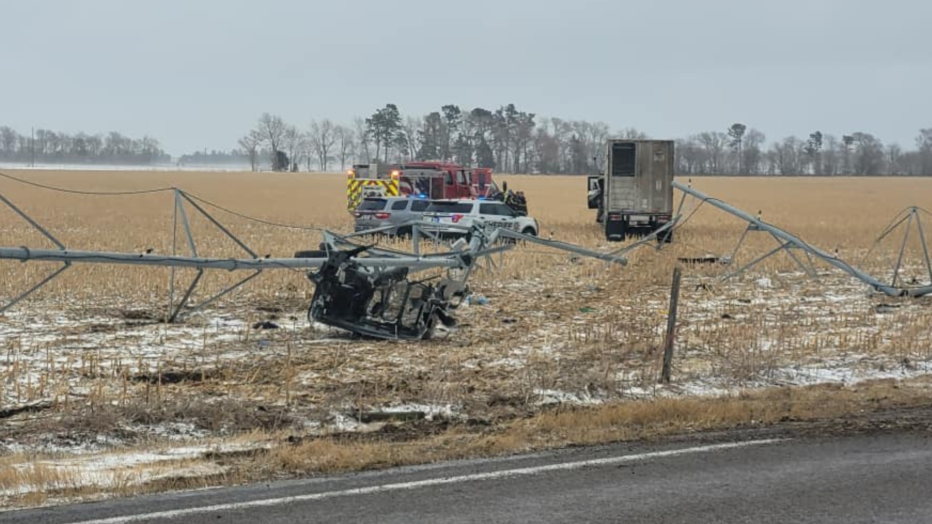 Semi blown off rural Nebraska road strikes pivot in field, sheriff's ...