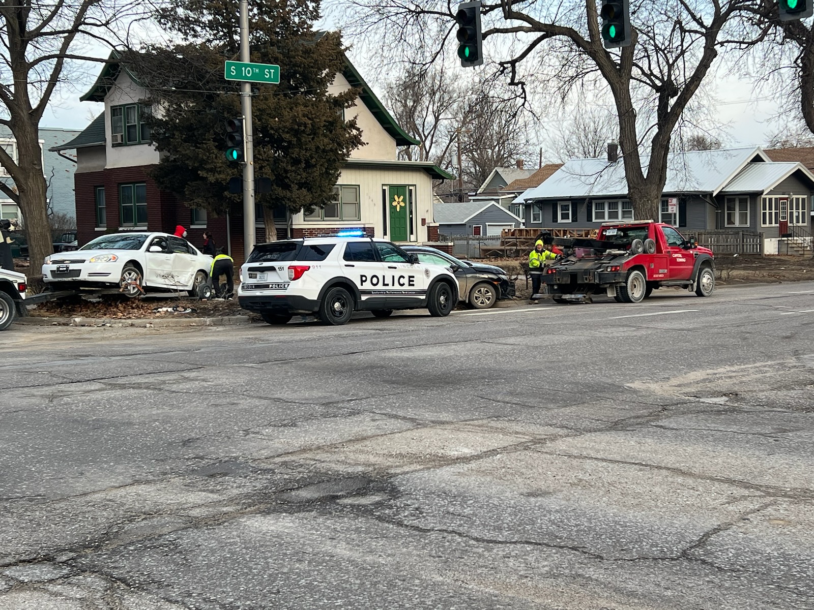 Vehicles drive off the road after two cars crash in Lincoln neighborhood