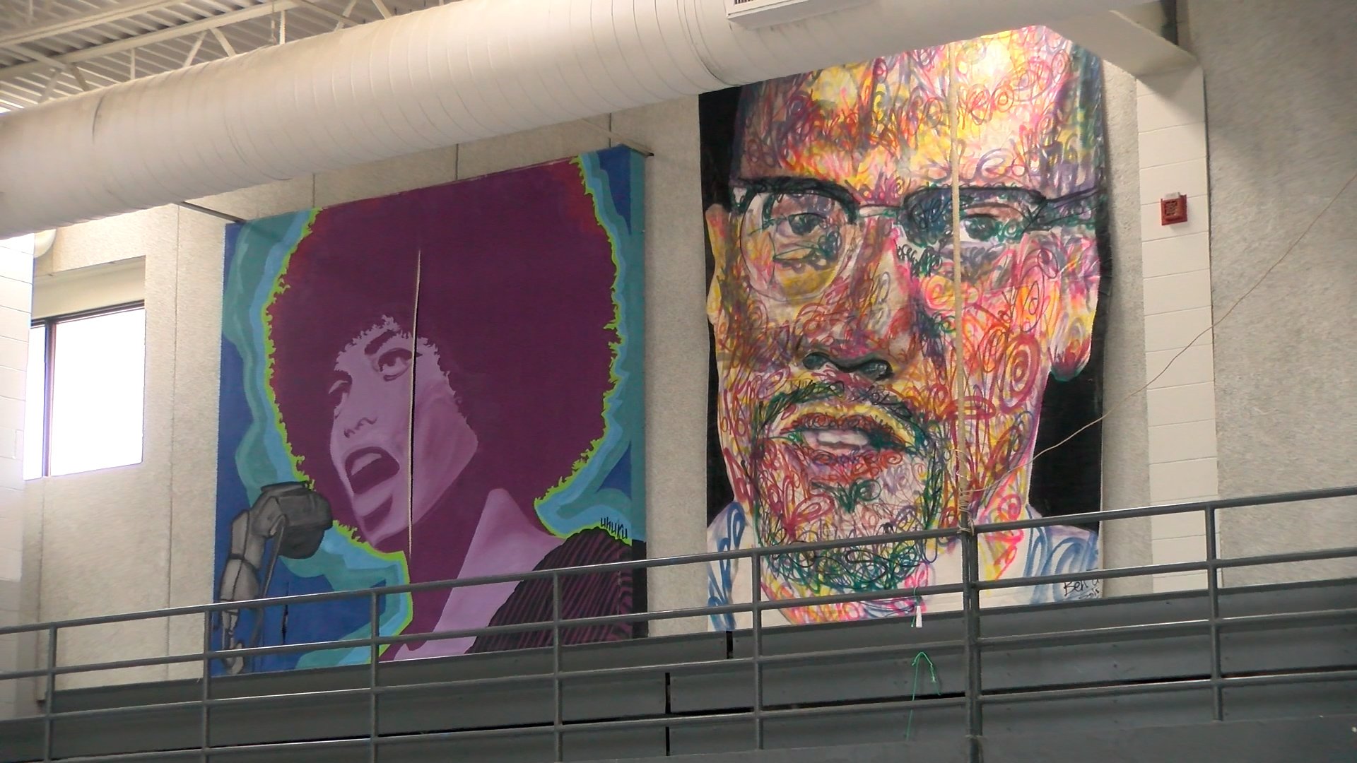 Malone Center in Lincoln partners with former Huskers to coach track team