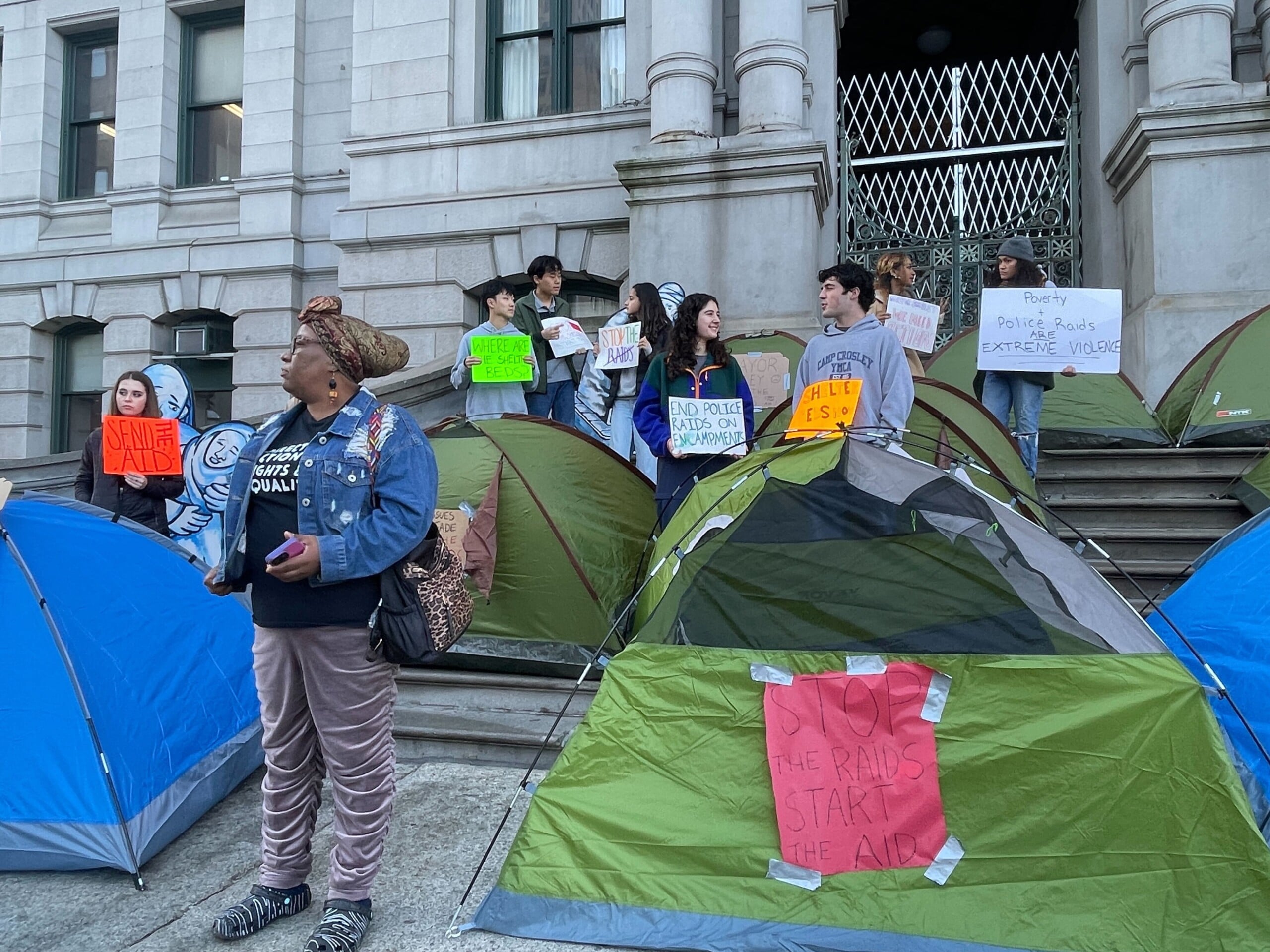 Demonstrators gather for change to Providence’s homeless encampment ...