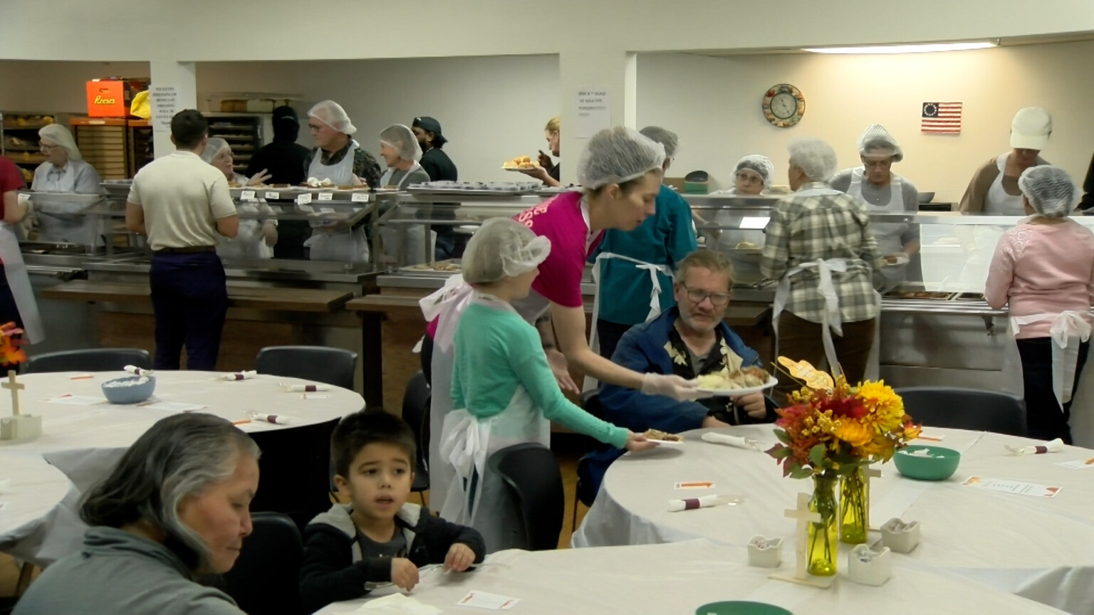 Families of volunteers help the People's City Mission serve up to 700 ...