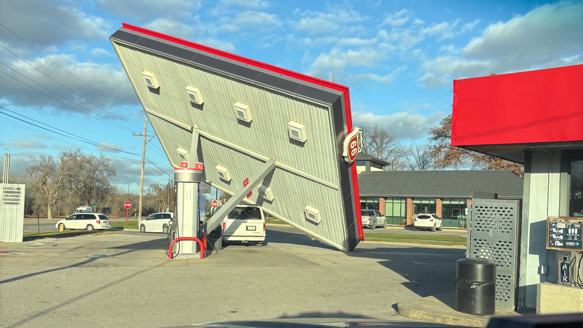 Severe winds topple canopy at Crete gas station