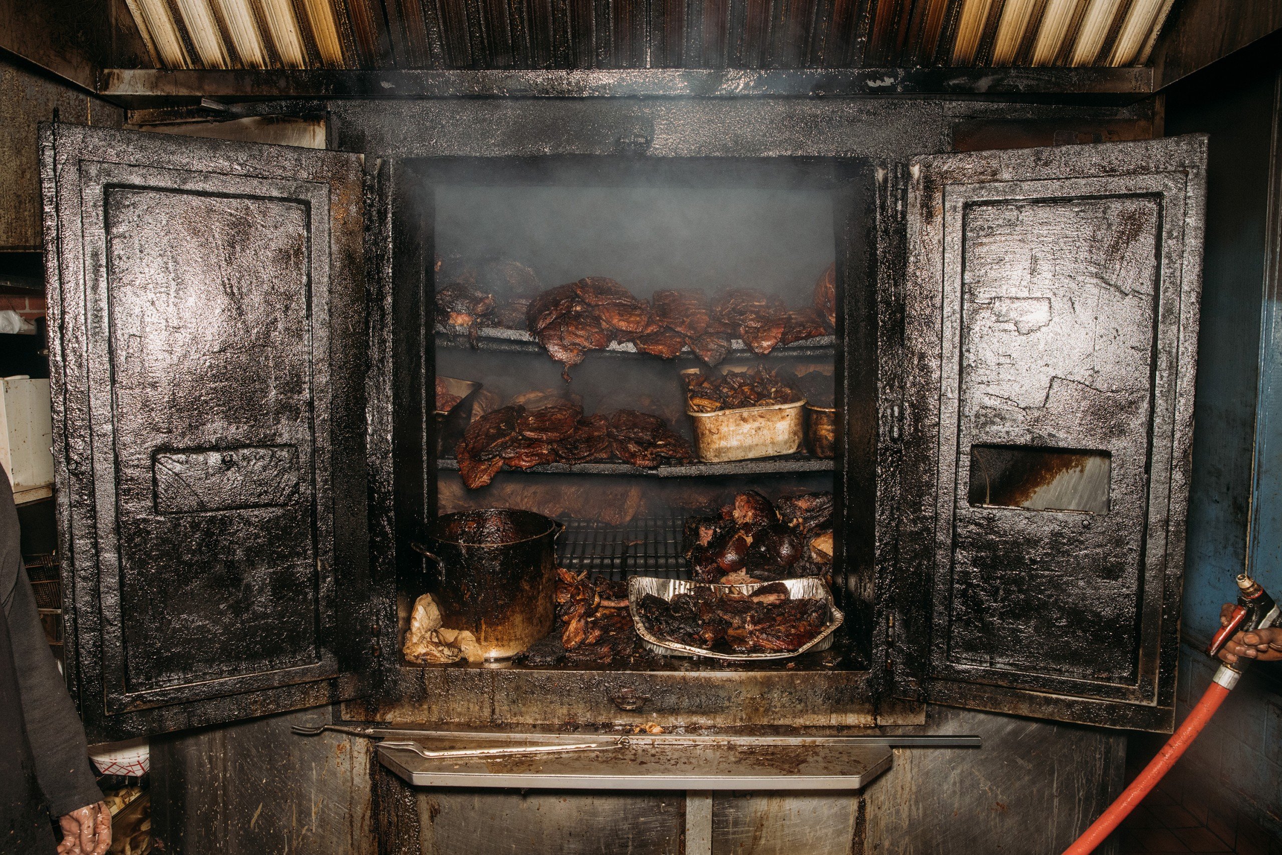 Our city’s barbecue is sweet and spicy, but its history is slow-cooked