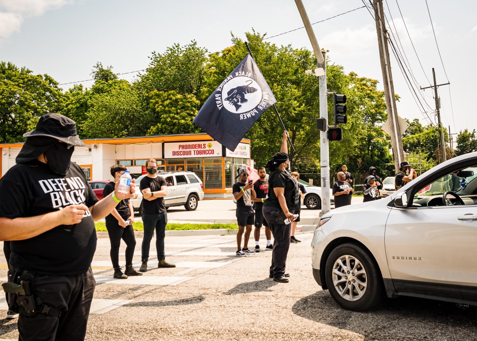 Black Panther Party marches from Troost to Prospect to show community ...