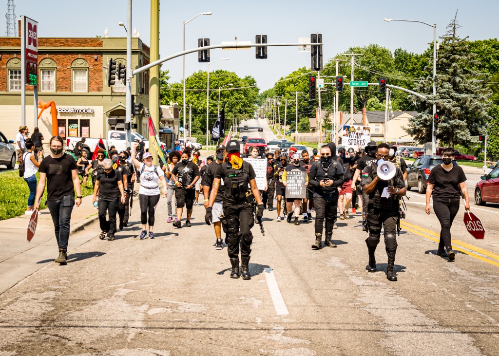 Black Panther Party marches from Troost to Prospect to show community ...