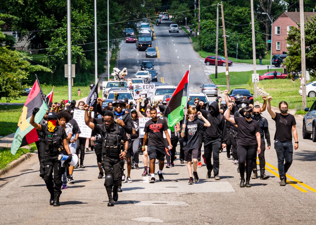 Black Panther Party marches from Troost to Prospect to show community ...