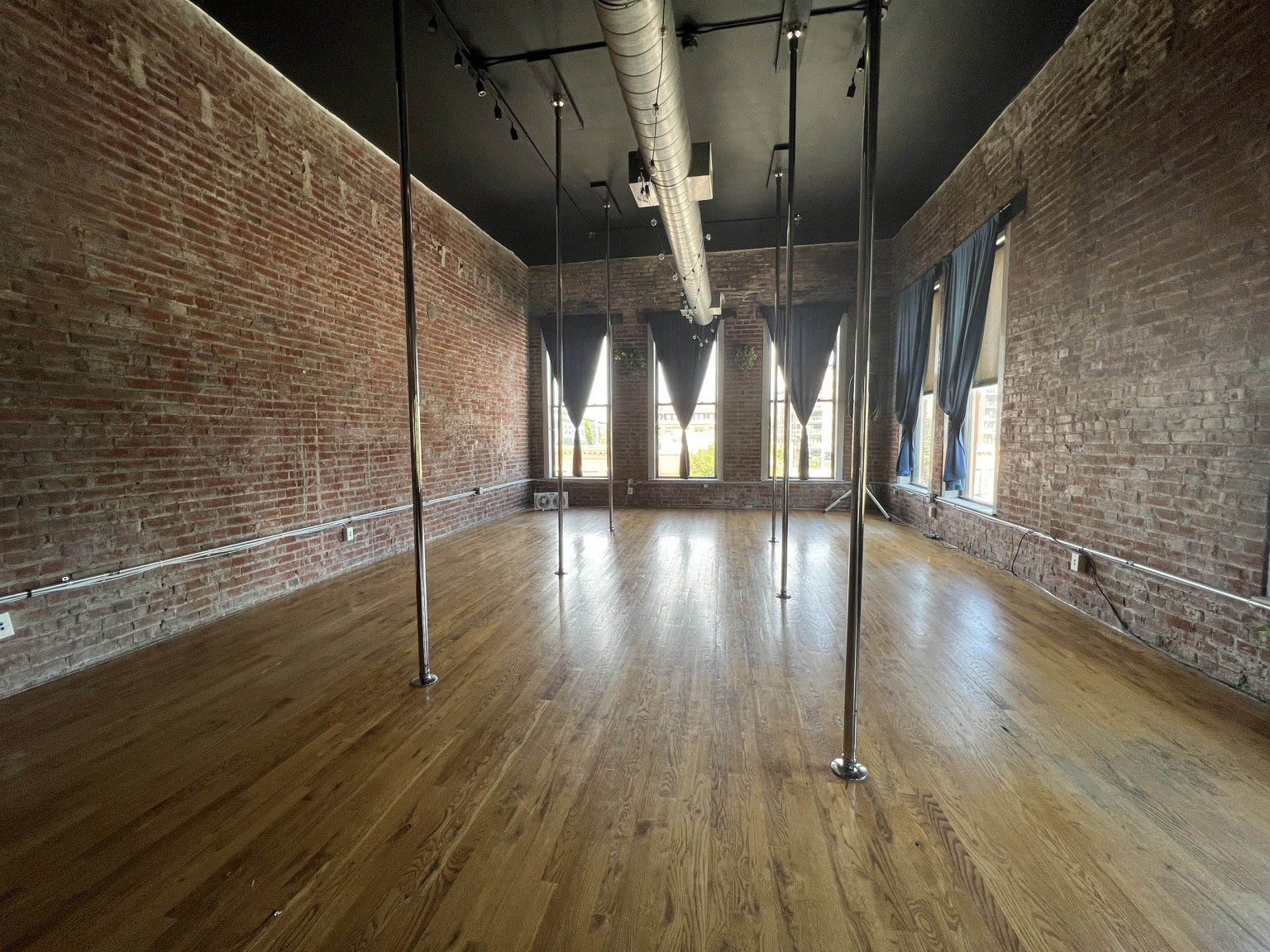 Laura Martin Elevates Pole Dancing In Kc With Alchemy Space