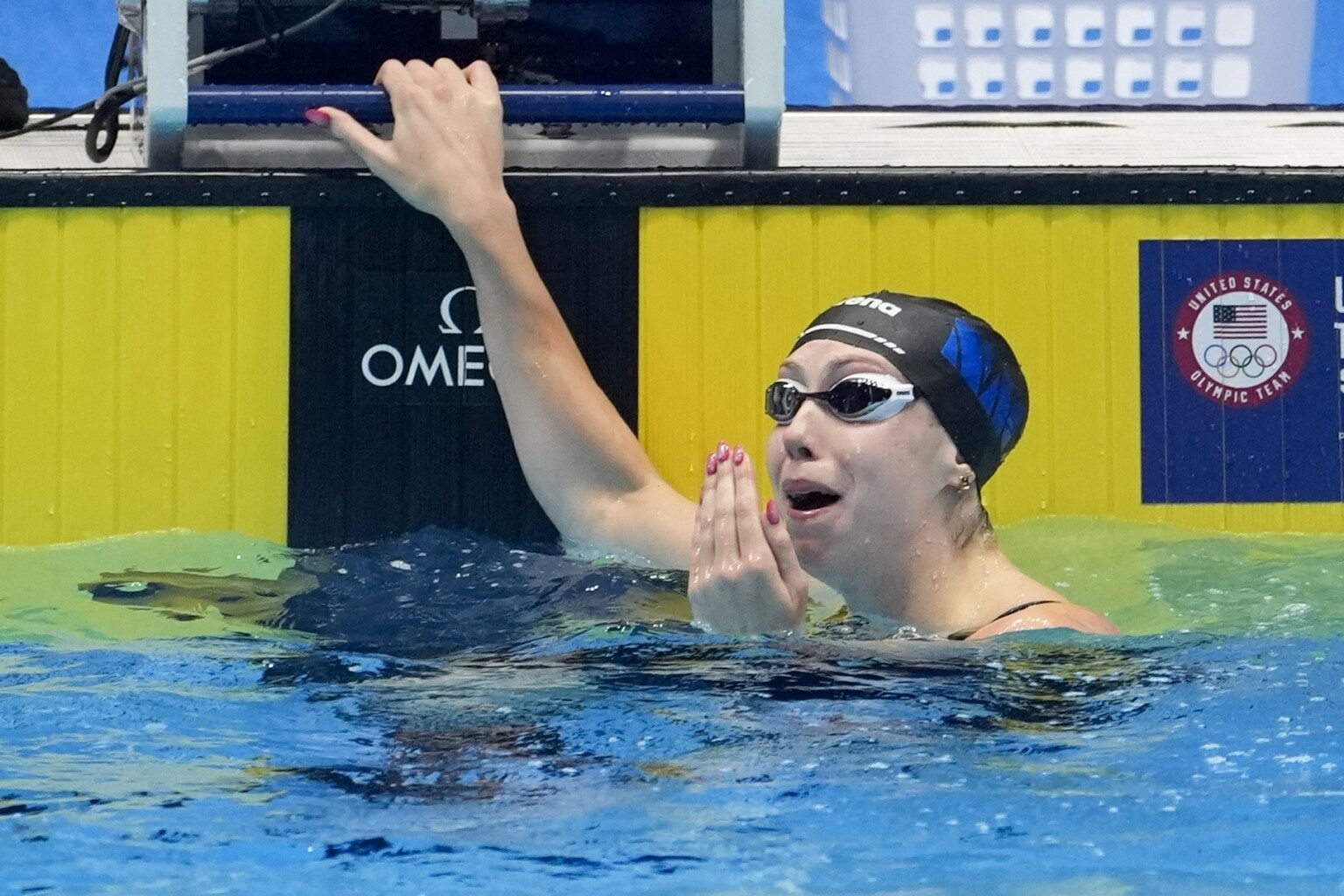 Gretchen Walsh sets a world record in the 100-meter butterfly at the U ...