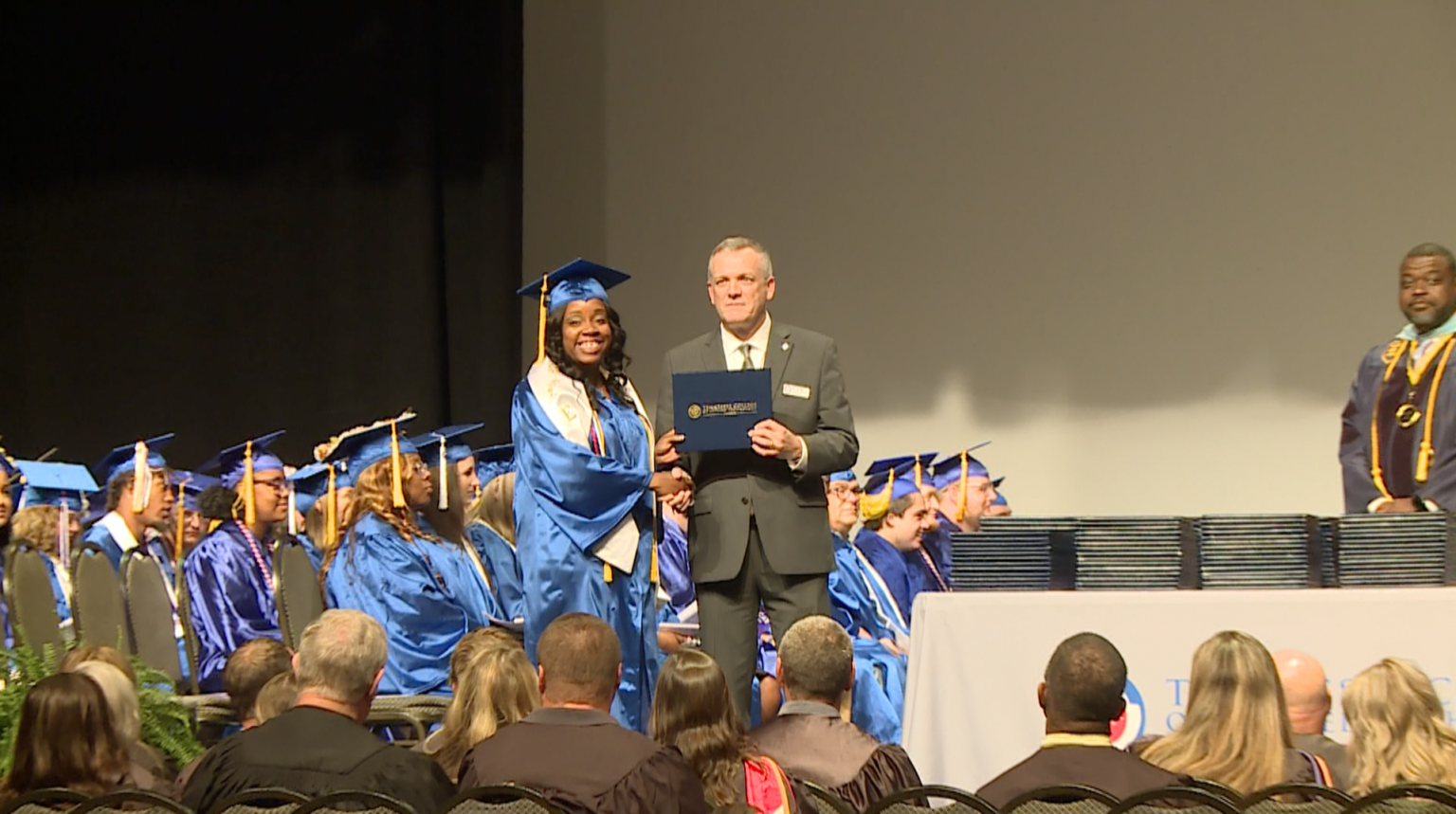 More than 100 students cross the stage during TCAT graduation ceremony ...