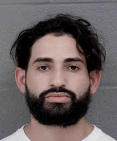 Christopher Collado Carrying Concealed Gun - WCCB Charlotte