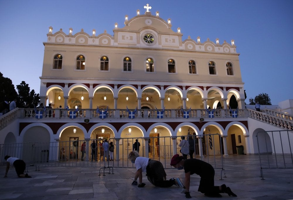 Pilgrims Crawl In Front Of The Holy Church Of Panagia Of Tinos, On The ...