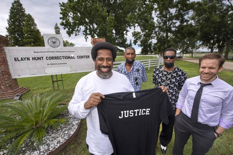 Sullivan Walter, 53, left, holds a shirt near Elayn Hunt Correctional ...