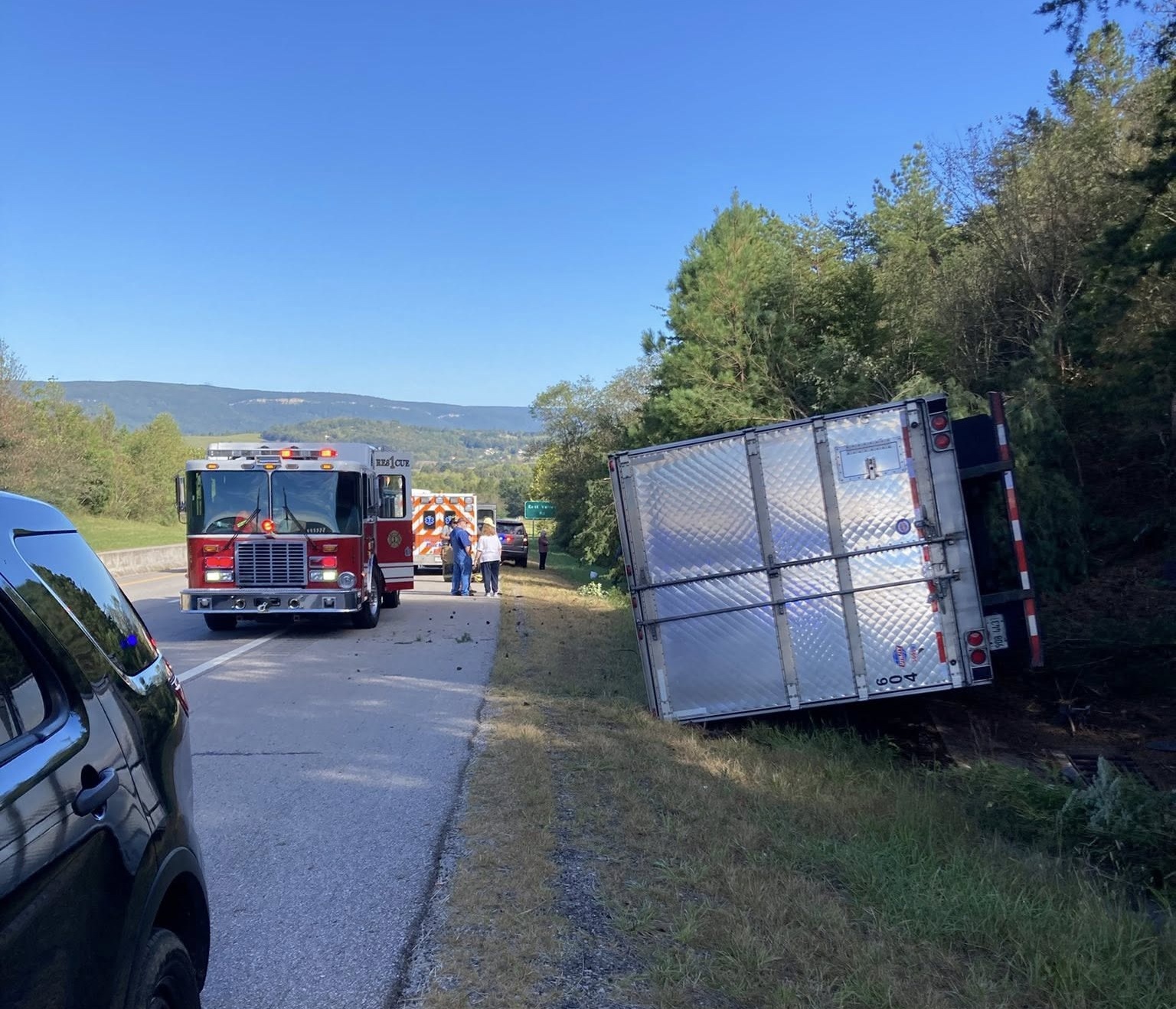 Semi-truck carrying milk flipped over on Highway 111 - WDEF
