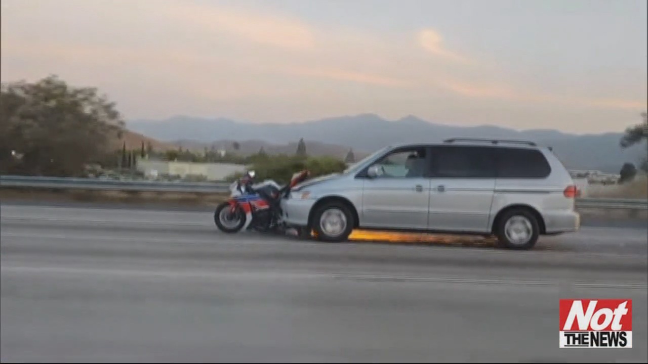 Minivan Travels Down Road Pushing Motorcycle - WFXB