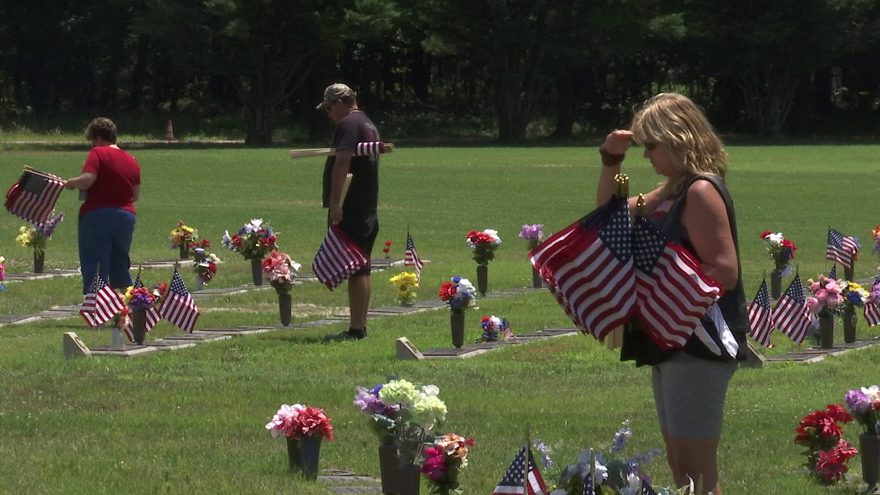 Families honor veterans with planting of American flags - 47abc