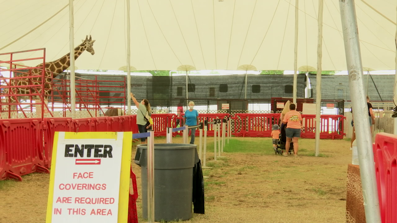 Fairgoers enjoy petting zoo at the Delaware State Fair - 47abc
