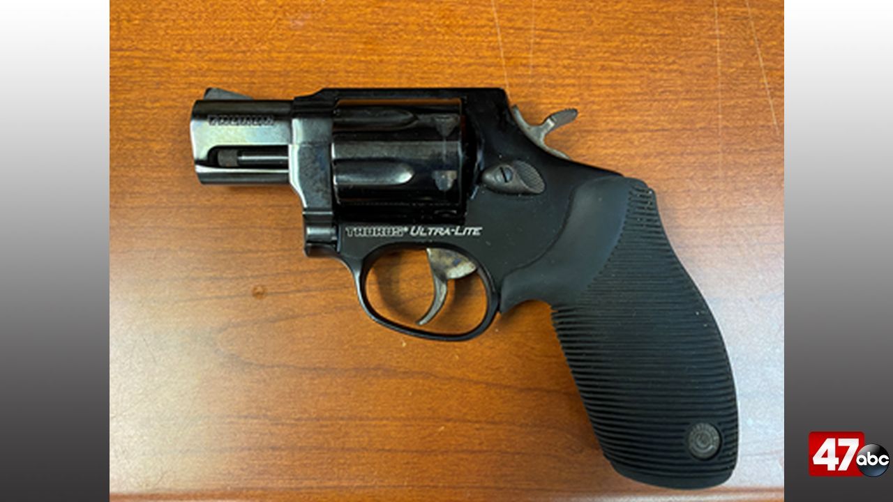 Pair arrested after stolen gun found during early morning traffic stop ...
