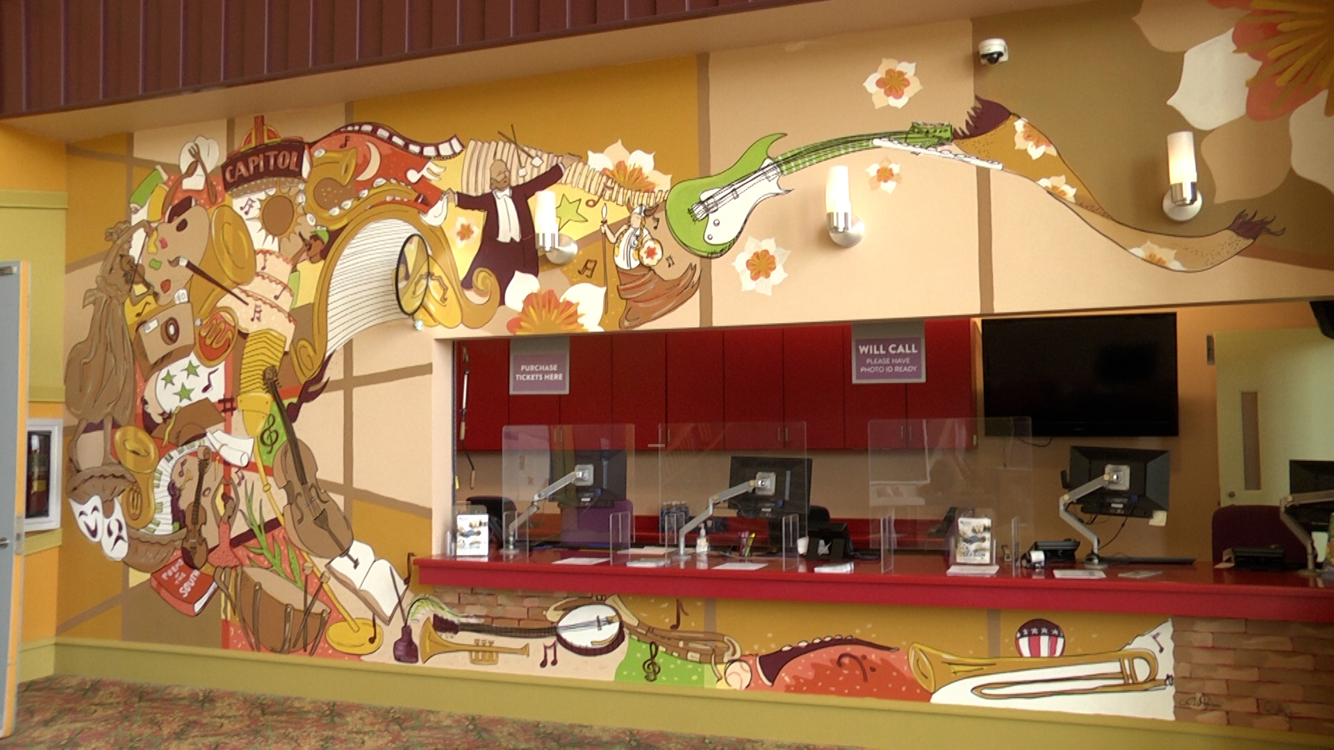 Local artist creates a mural for SKYPAC ticket office - WNKY News 40 ...