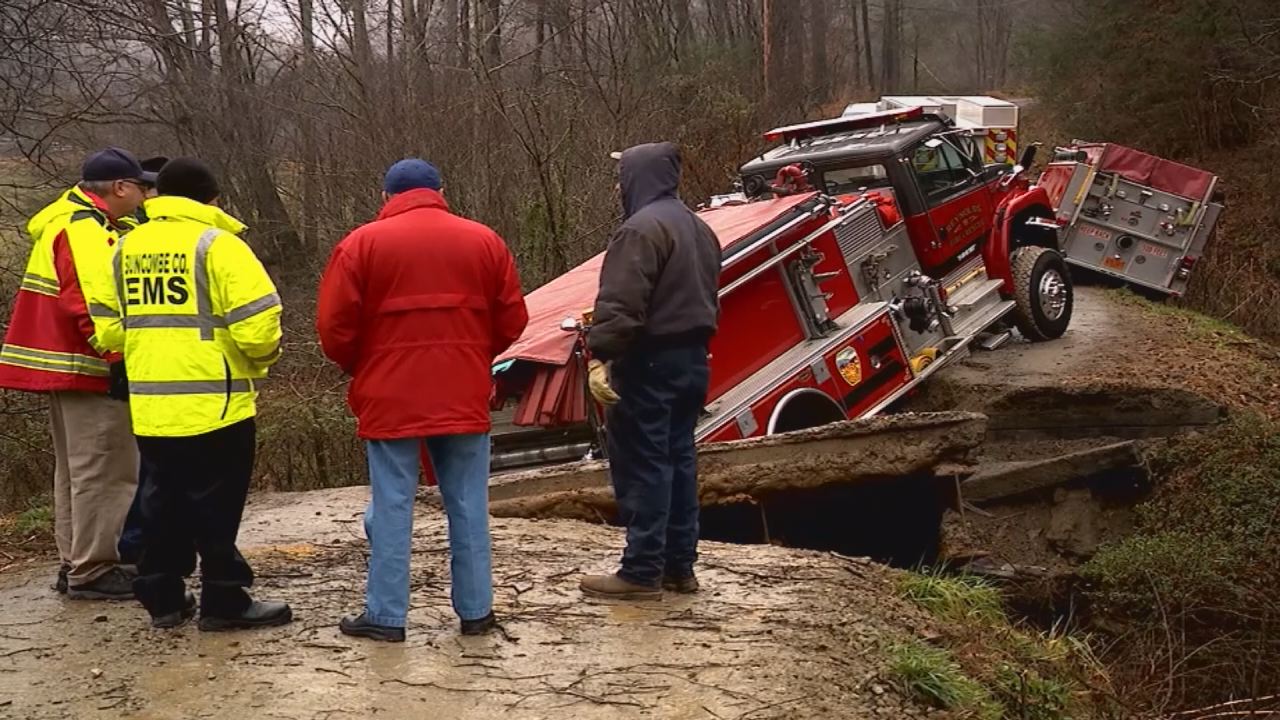 Firetruck gets stuck in creek on way to house fire in Buncombe County ...