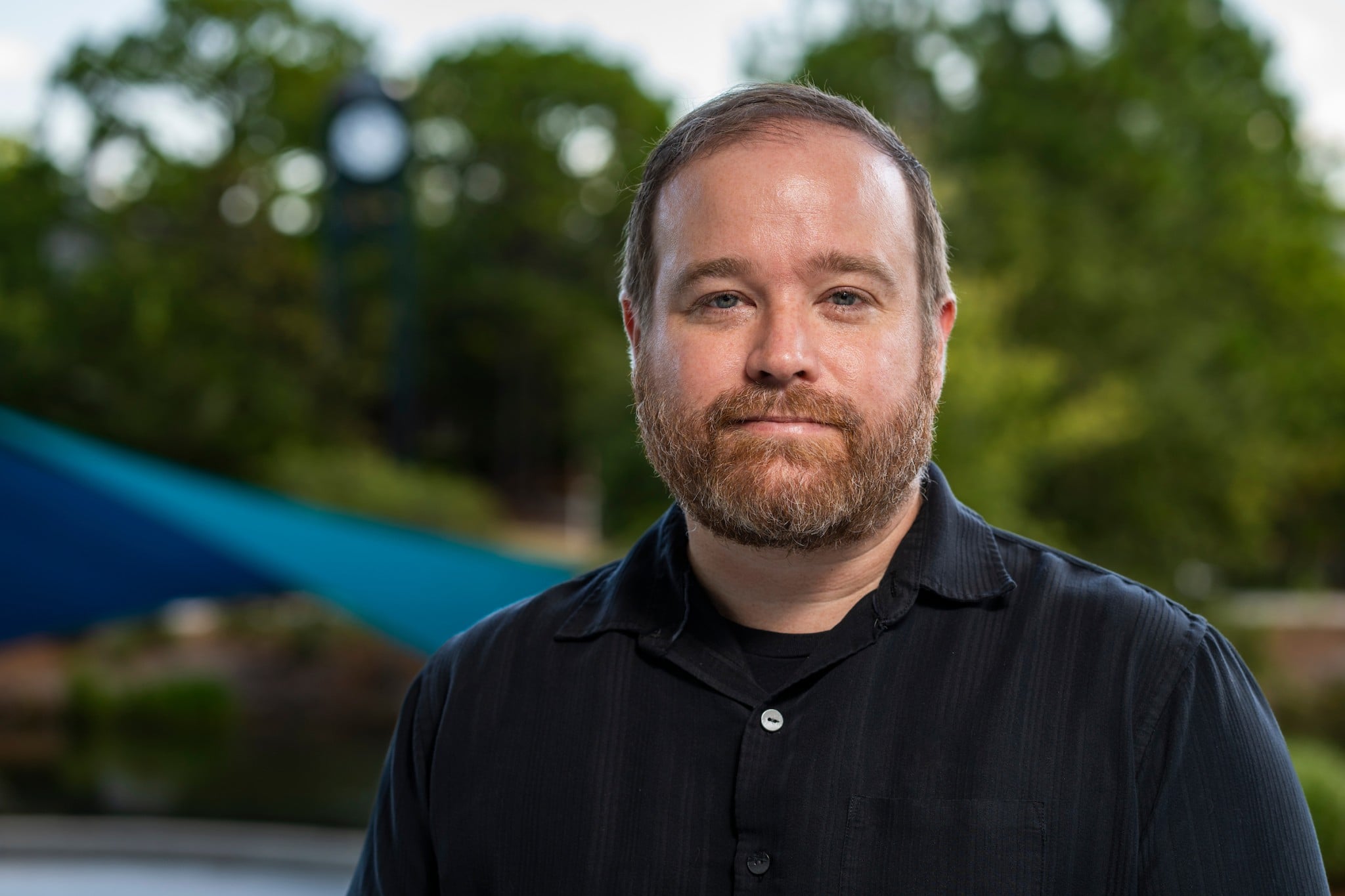 UNCW's Travis Woods receives Governor's Awards for Excellence - WWAYTV3