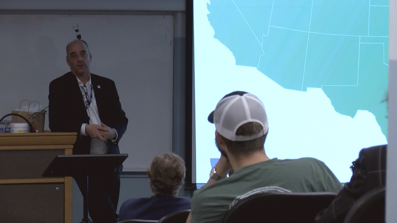 ILM director shares airport growth data with UNCW research community ...