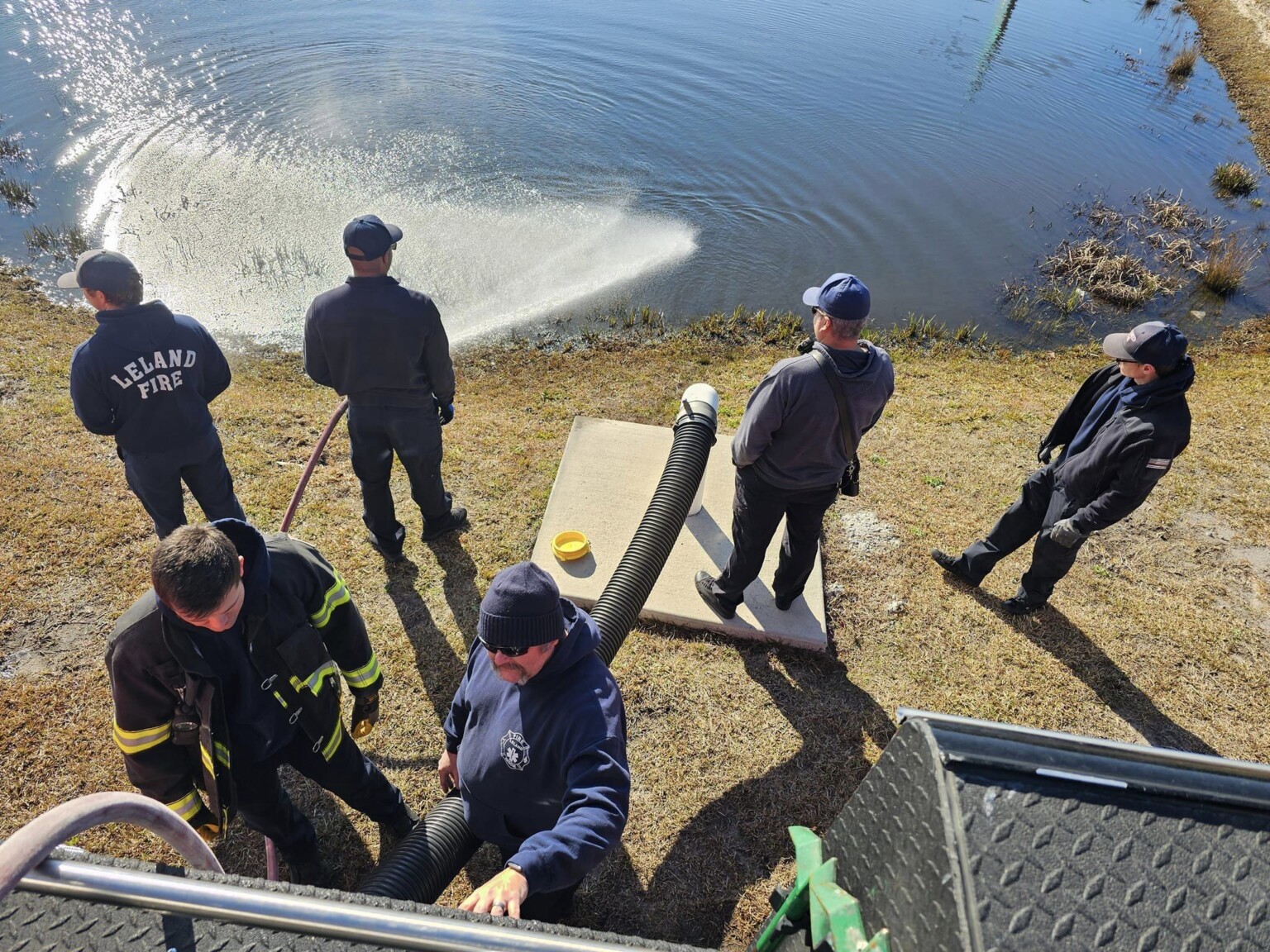 Leland Fire/Rescue conduct drafting training, drawing water from ...